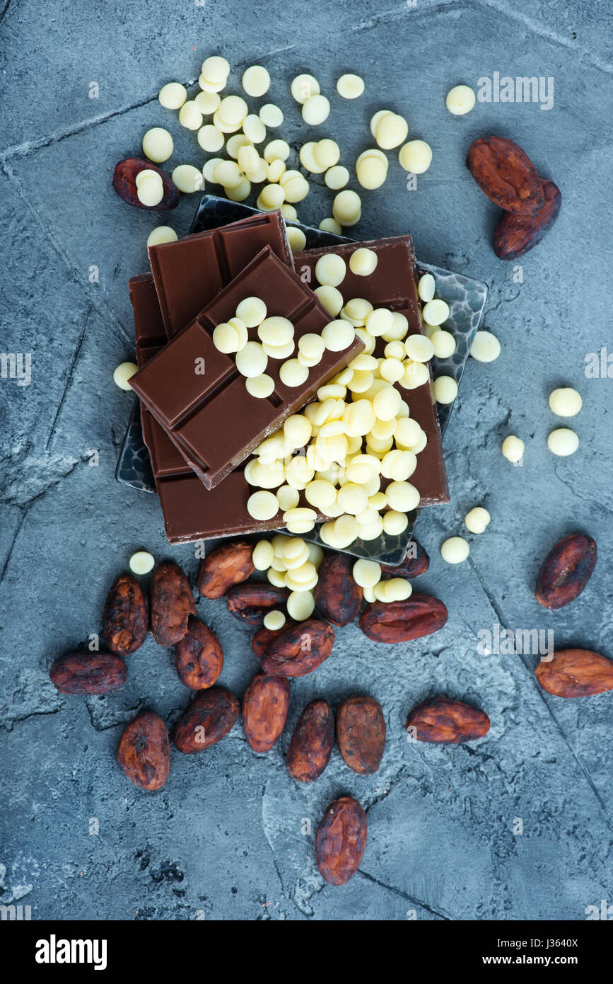 chocolate and cacao on metal plate and on a table Stock Photo - Alamy