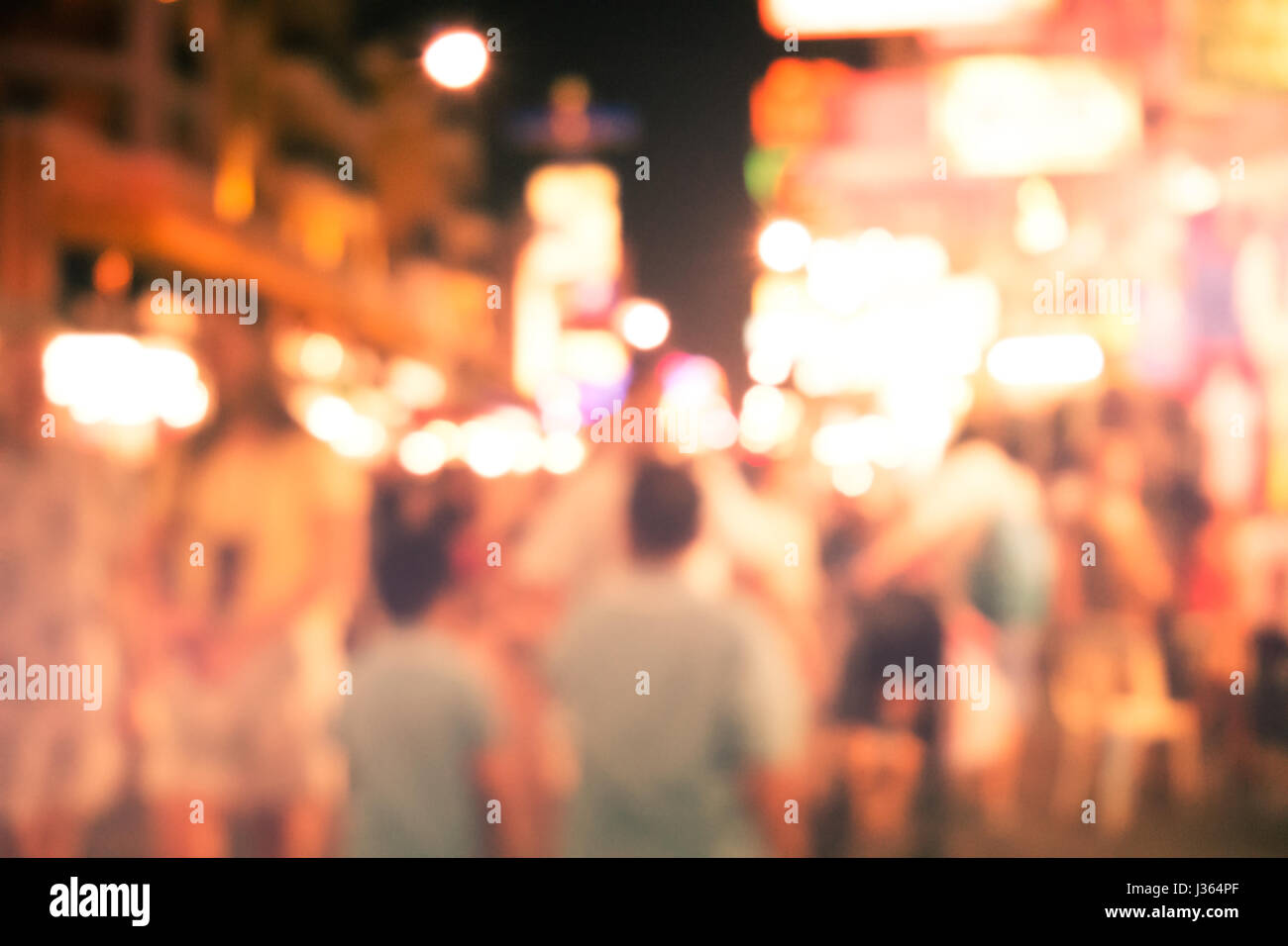 Blurred image of busy night life in the city Stock Photo - Alamy