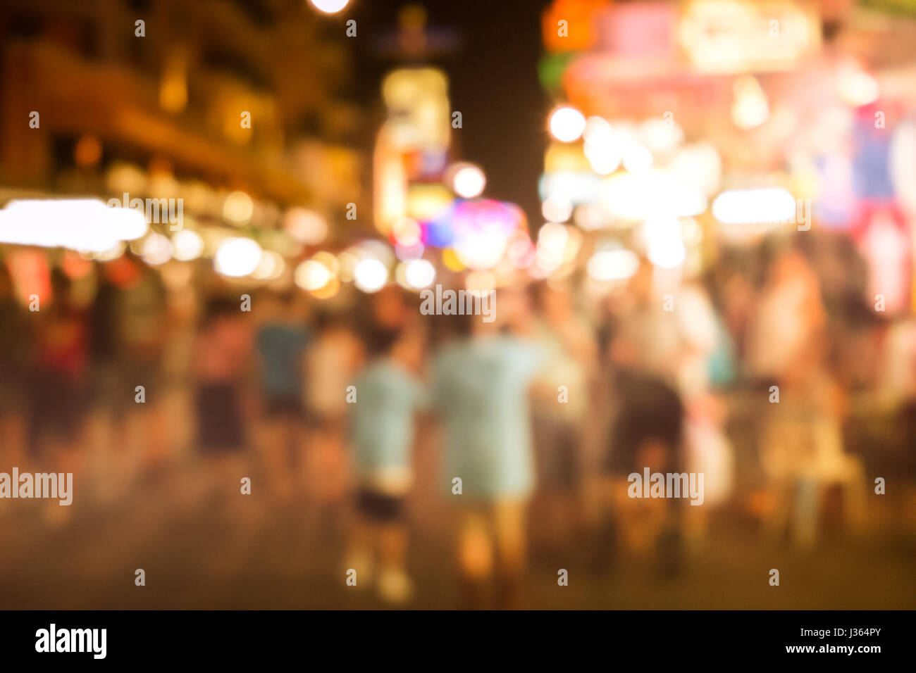 Blurred image of busy night life in the city Stock Photo - Alamy