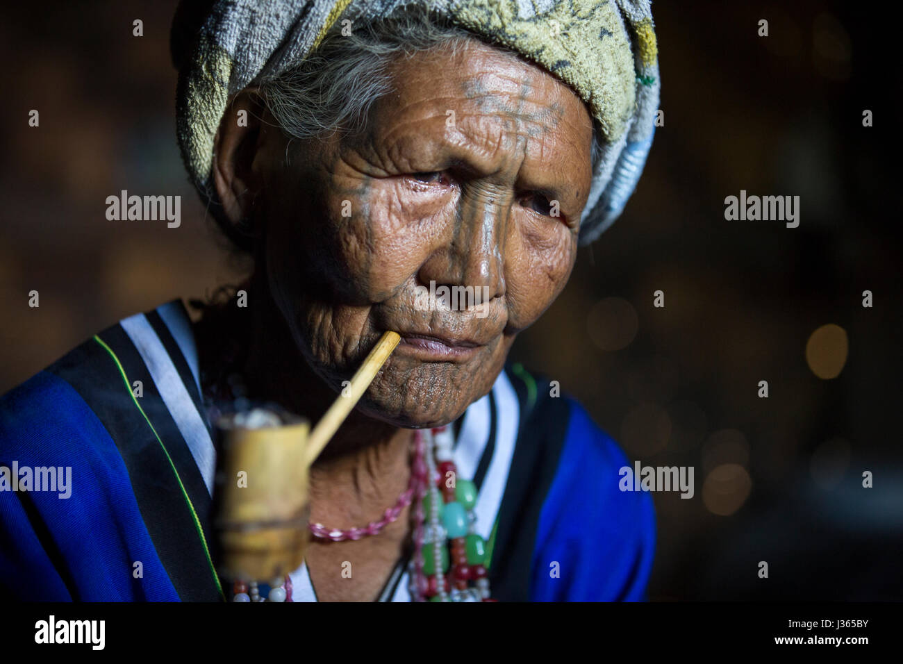 Woman smoking in kitchen hi-res stock photography and images - Alamy
