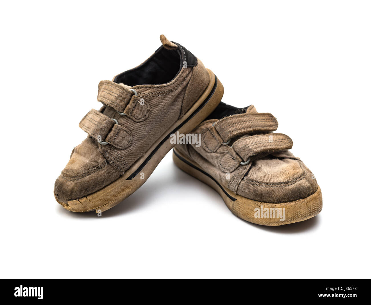 pair of old grey shoes on a white background Stock Photo - Alamy