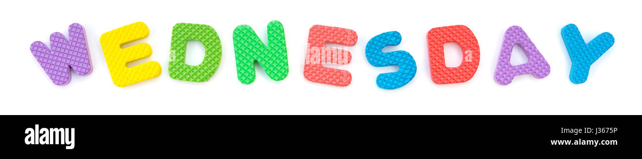 word of WEDNESDAY shaped by alphabet jigsaw puzzle on white Stock Photo ...