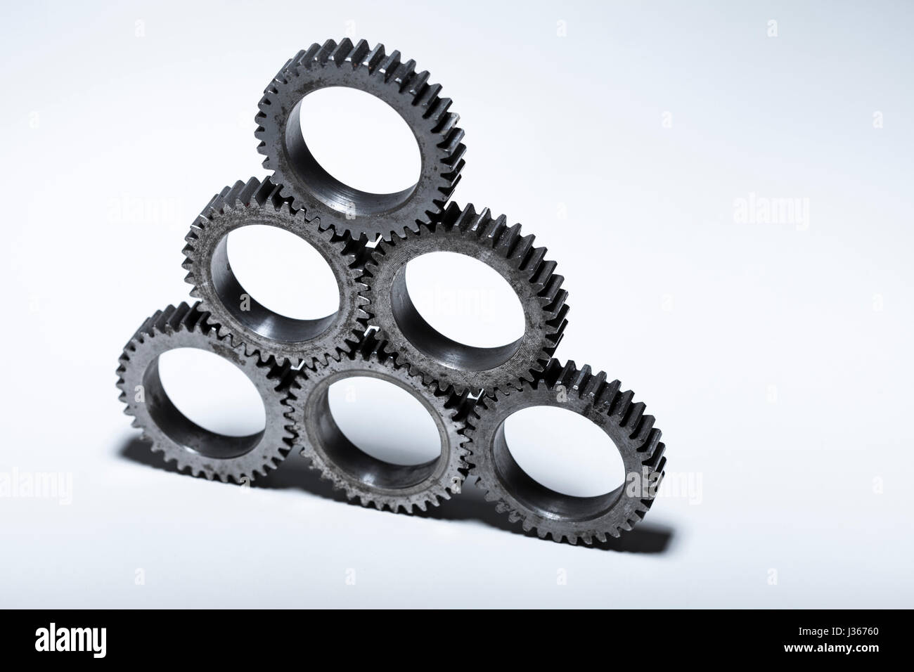 Machine turning gears cogs metal hi-res stock photography and images ...
