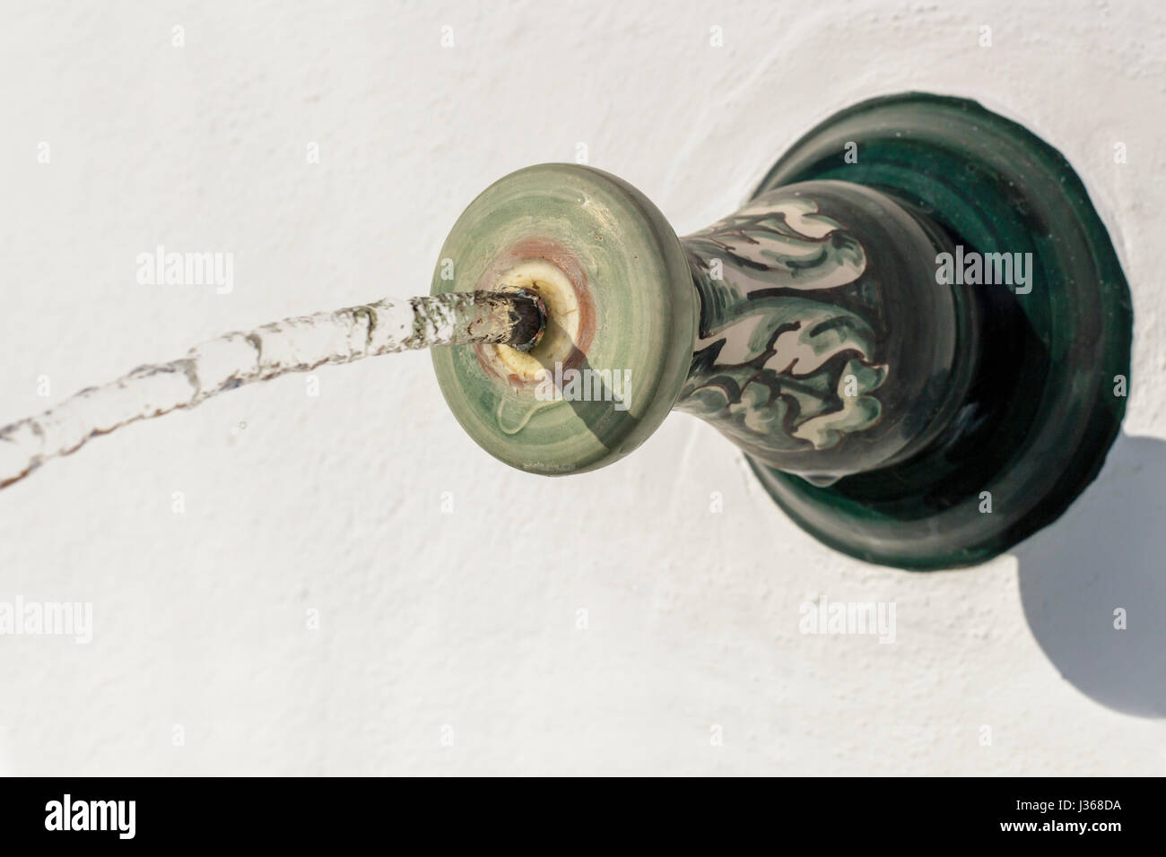 Close-up of water jet falling into a swimming pool Stock Photo - Alamy