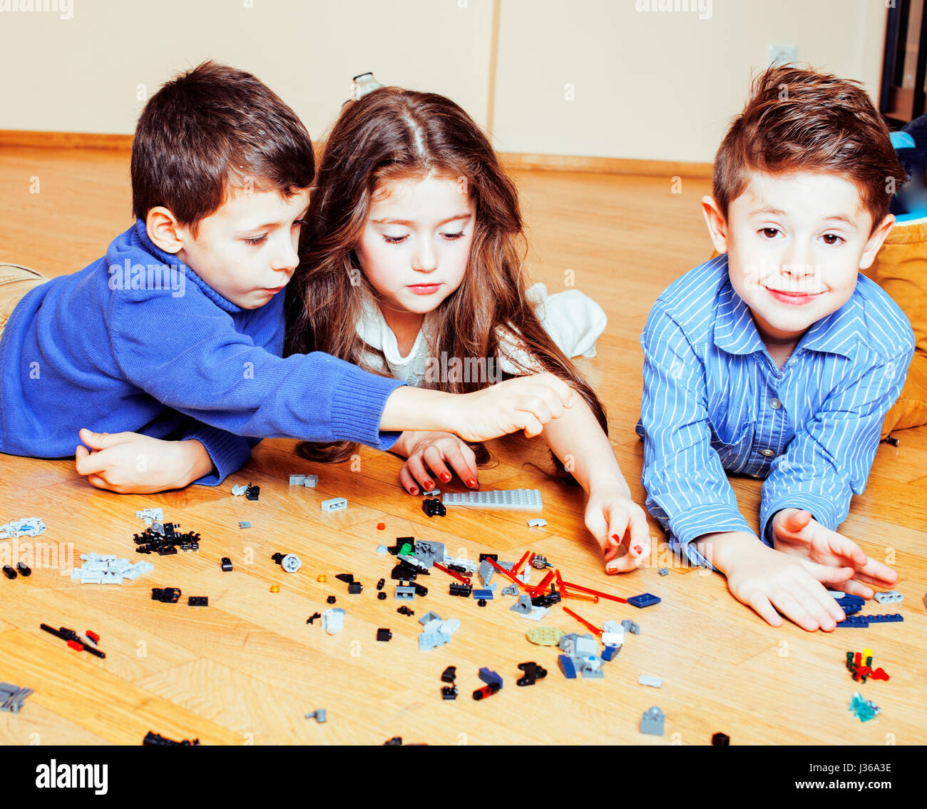 funny cute children playing toys at home, boys happy smiling, first ...