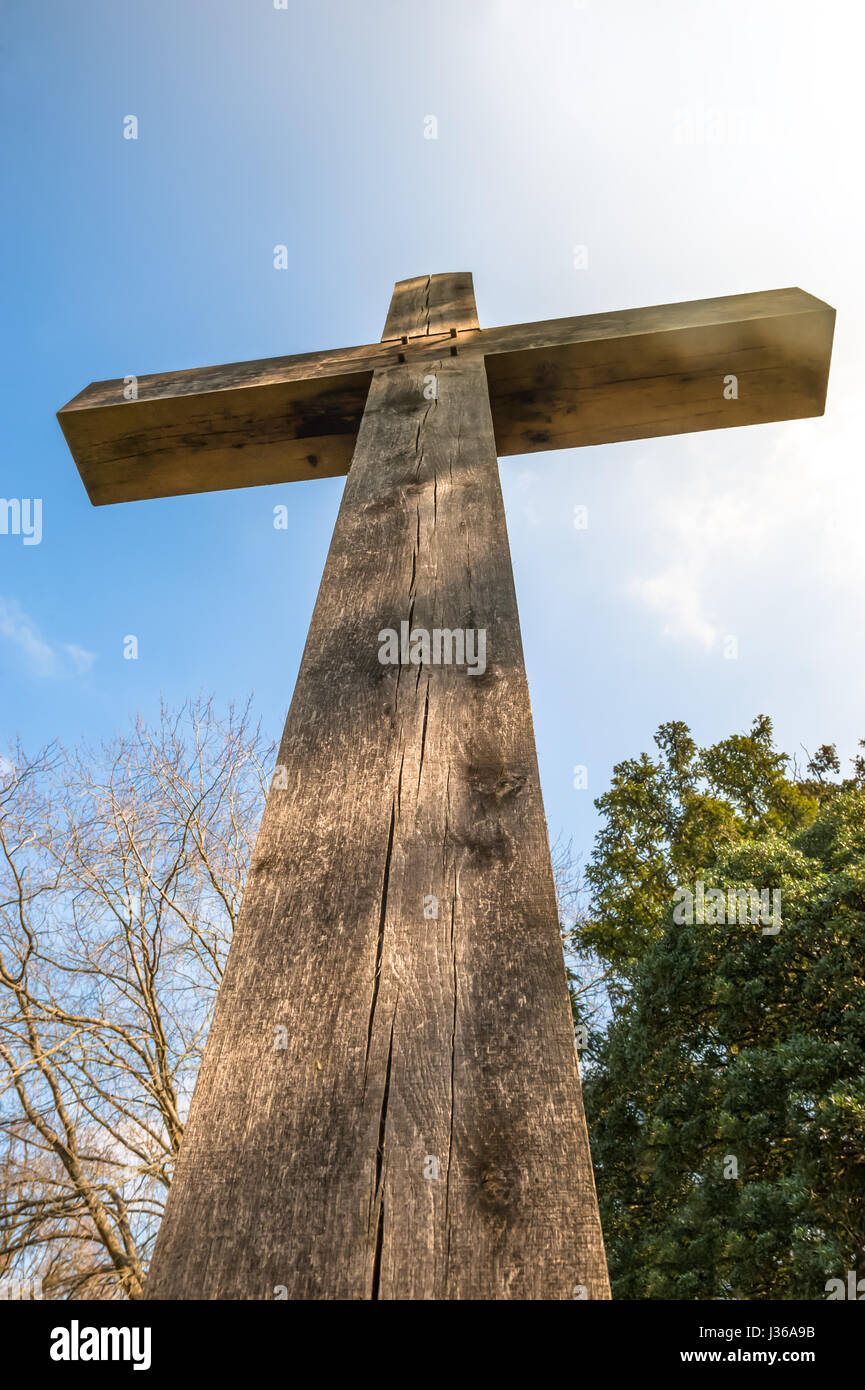 large wooden crucifix against a gradient blue sky Stock Photo - Alamy