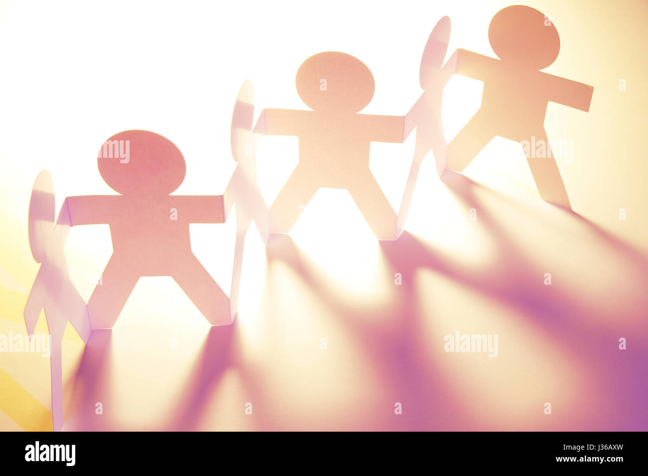 Team of paper doll people Stock Photo - Alamy