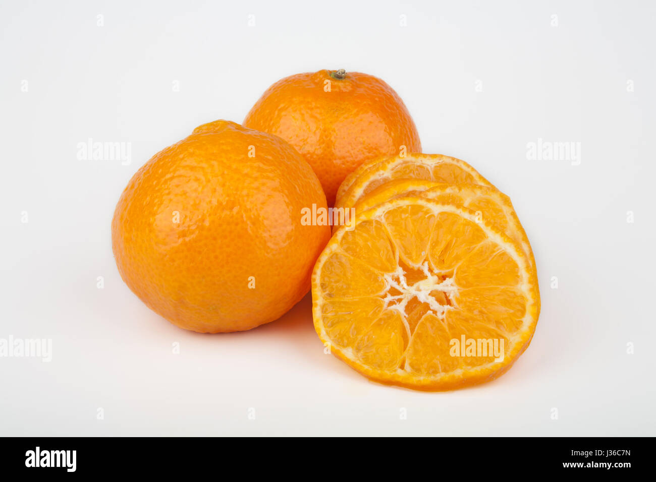 Whole and sliced clementine fruits isolated in white background Stock ...