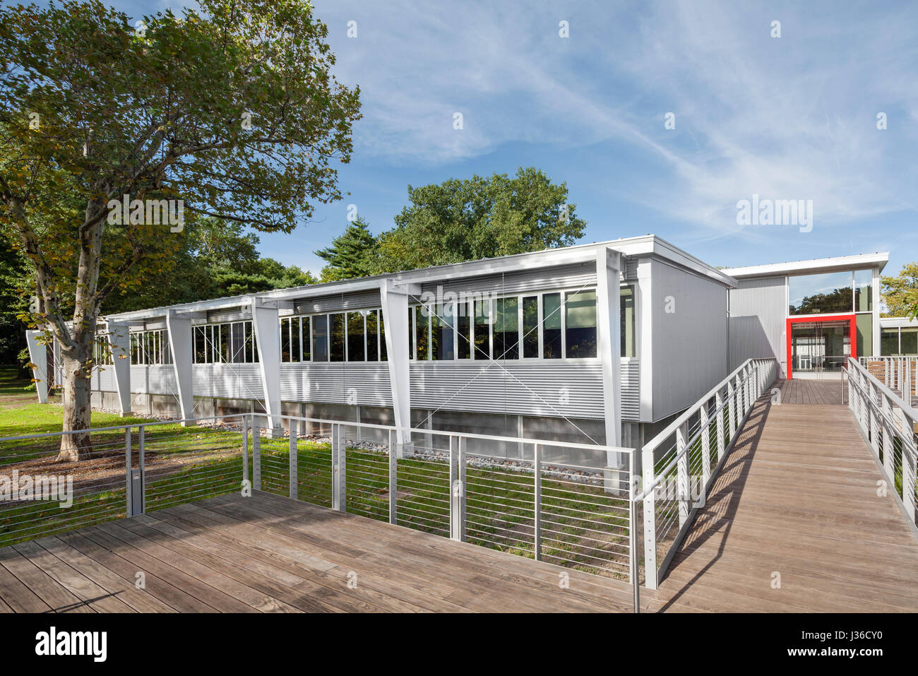 Exterior view with ramp leading to main entrance. Olmsted Center, New ...