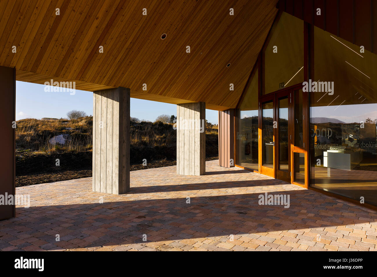 Exerior view of loggia showing ceiling pitch and glass entrance. Pearse ...
