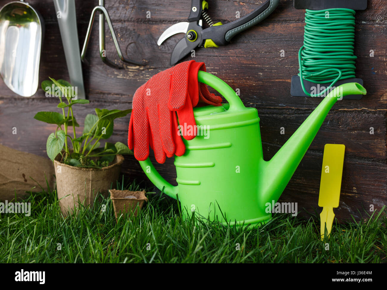 Gardening tools and equipment closeup in the backyard Stock Photo - Alamy