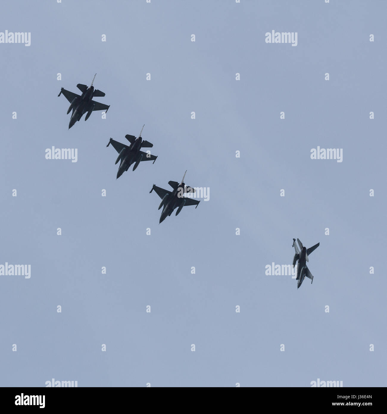 F-16's breaking formation during Frisian Flag exercise Stock Photo - Alamy