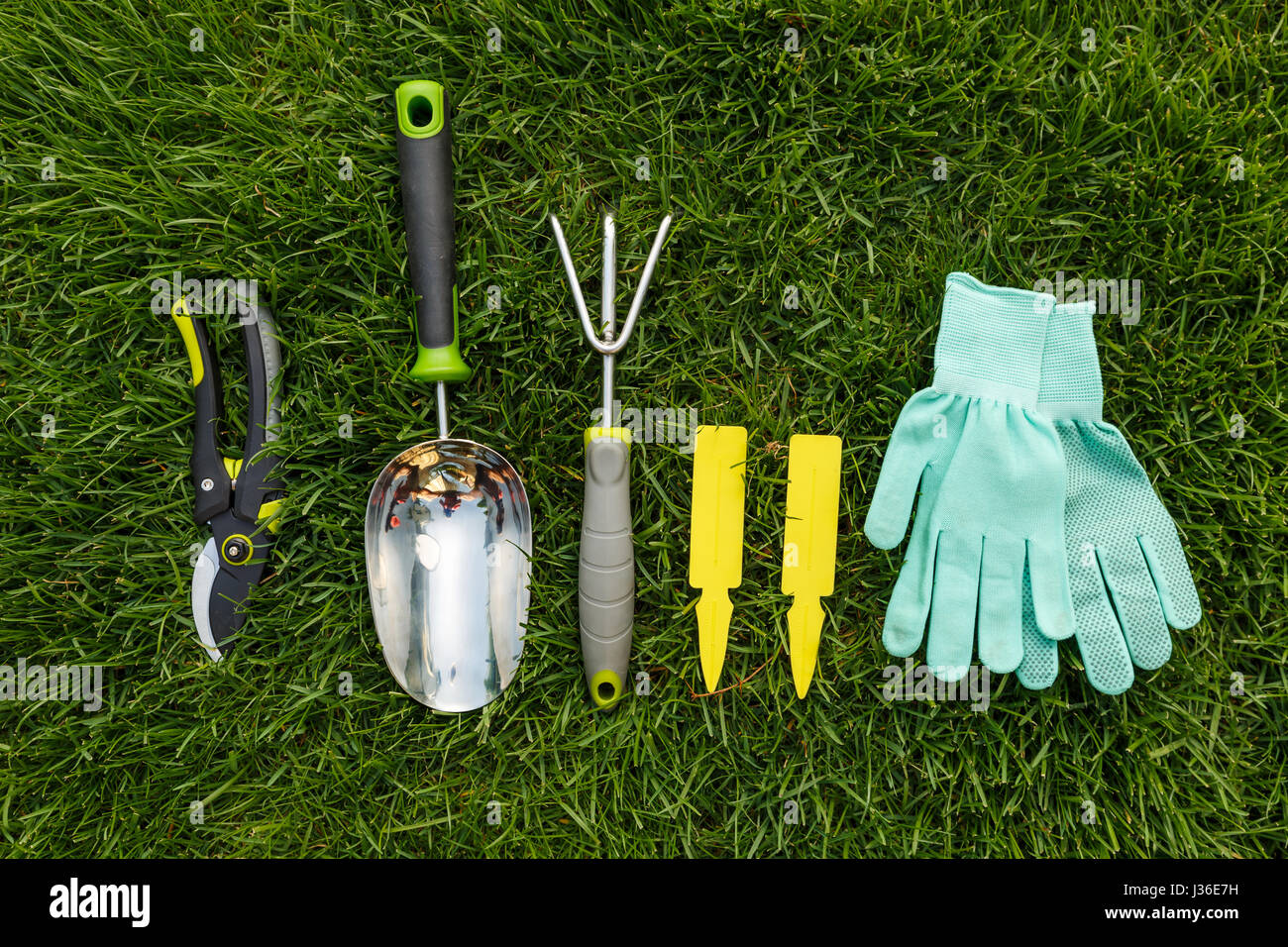Gardening tools and equipment closeup in the backyard Stock Photo - Alamy