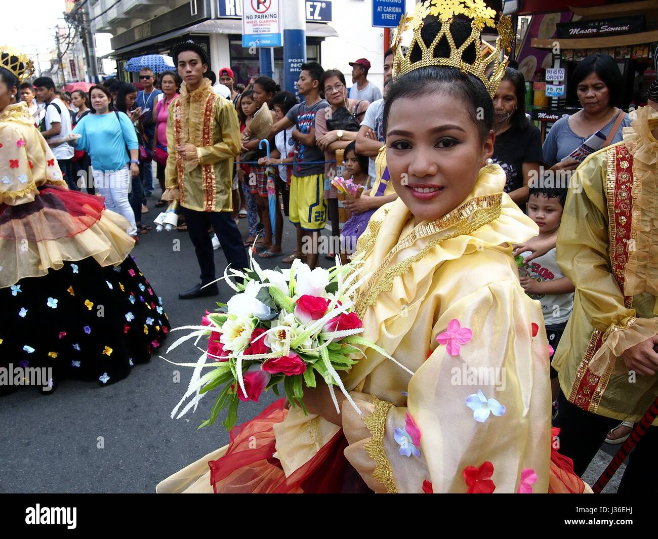 ANTIPOLO CITY, PHILIPPINES - MAY 1, 2017: A participant in her colorful ...