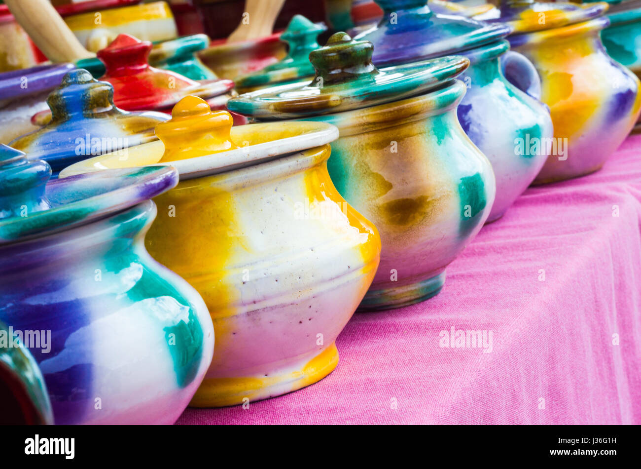 Beautiful Rustic handmade pots. Colorful pots Stock Photo - Alamy