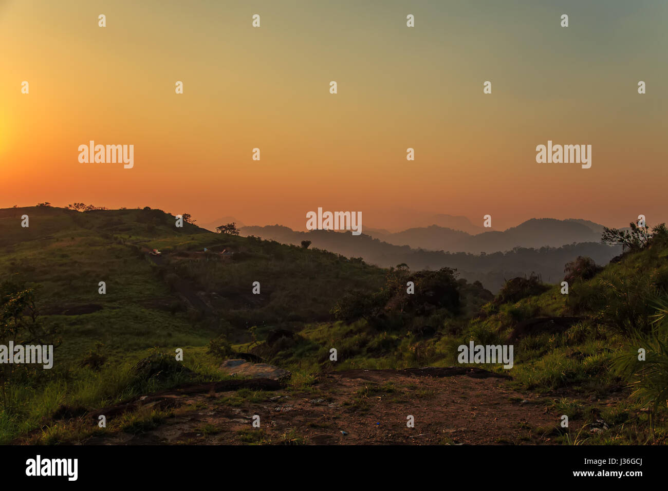 Beautiful sunset in the mountains. Munnar, Kerala state, South India ...