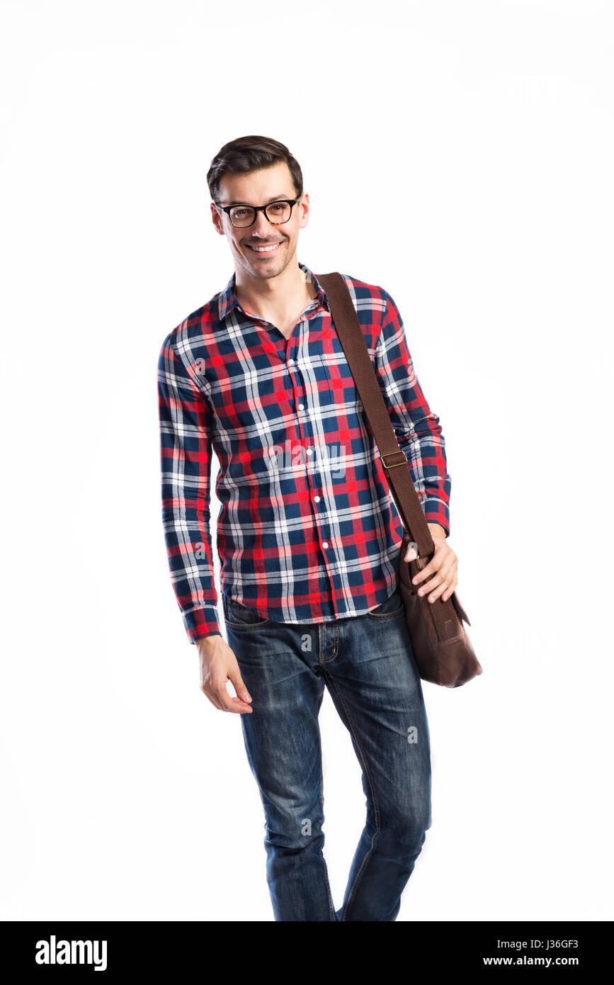 Handsome man in checked shirt, studio shot, isolated Stock Photo - Alamy