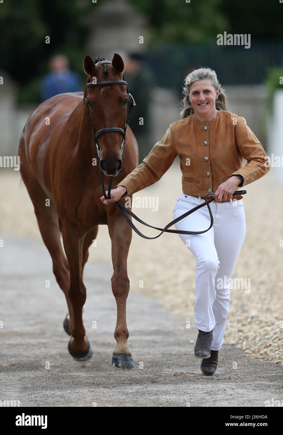 Great Britain's Kristina Cook leads out Billy The Red during the First ...