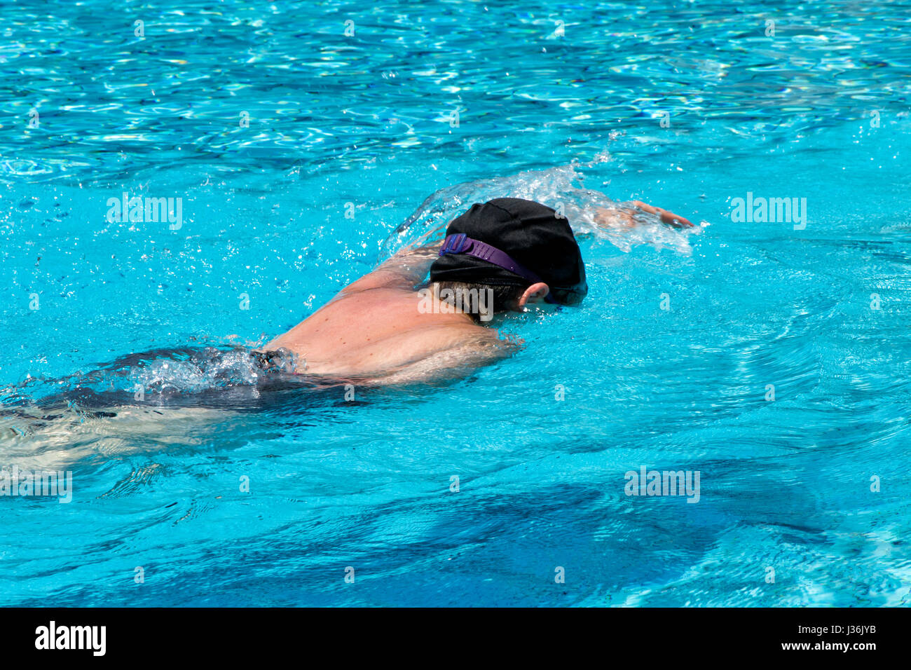 Woman swiiming in transparent water at SPA pool Stock Photo - Alamy
