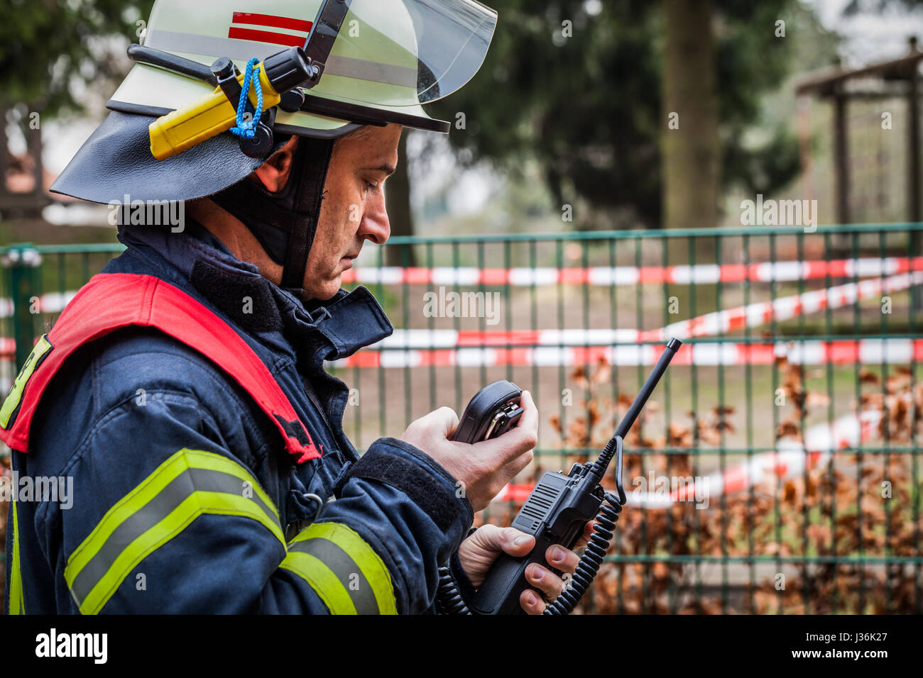 Firefighter used a walkie talkie in action - HDR Stock Photo - Alamy