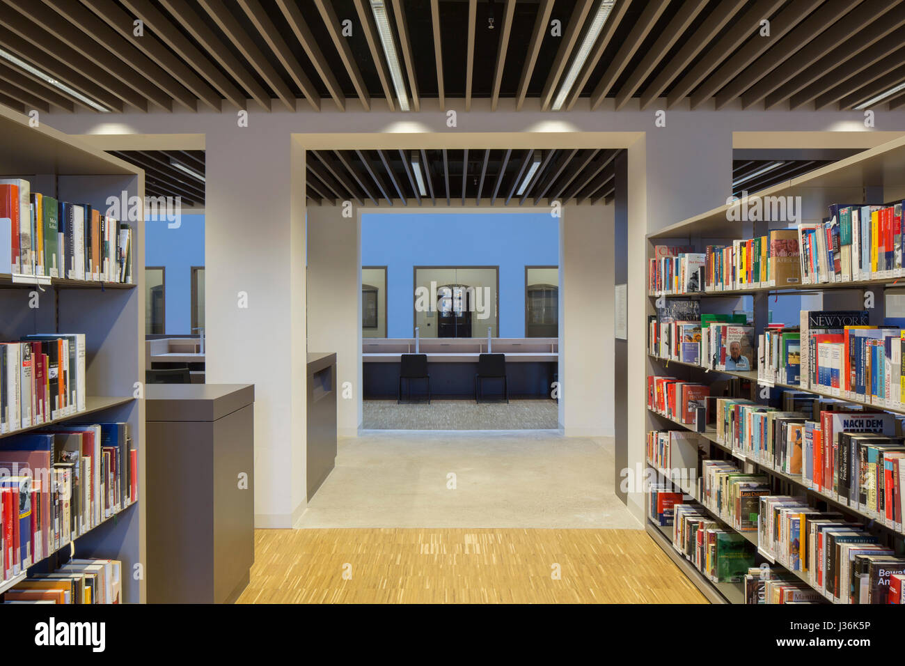 Library with view towards mezzanine reading space. Haus der Bildung ...