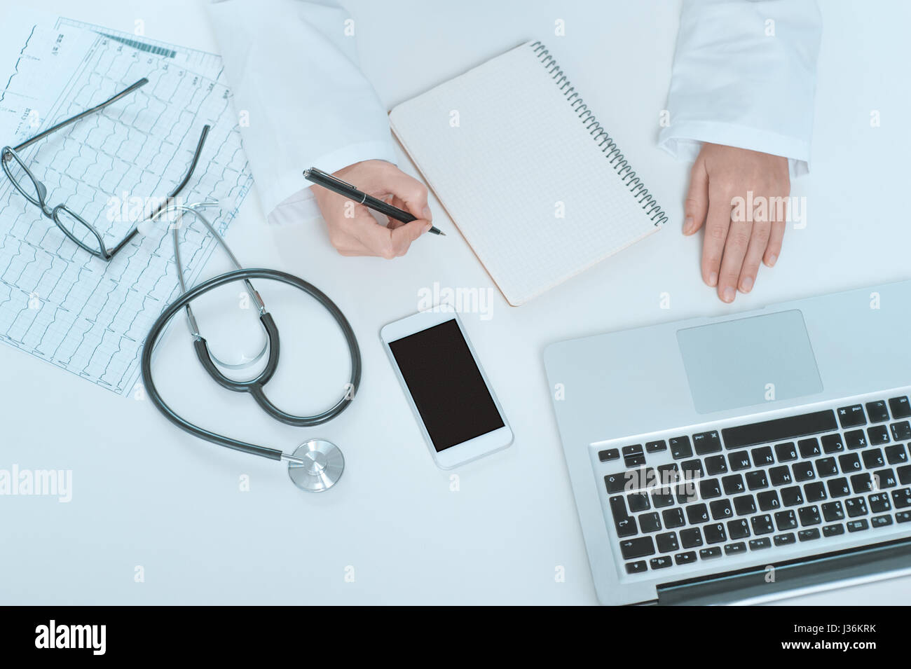 Young woman doctor occupation in the hospital office Stock Photo - Alamy