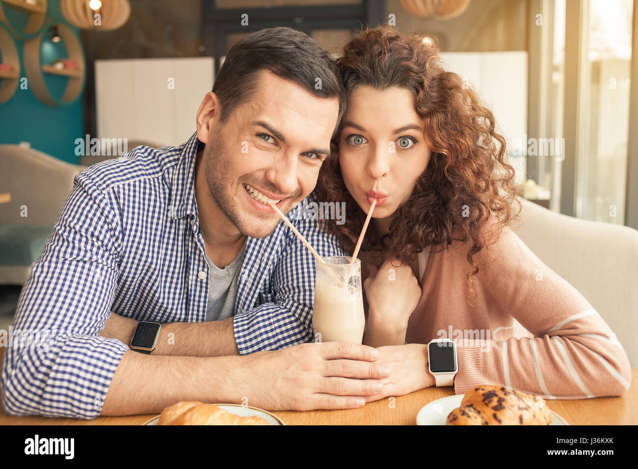 Nice looking couple in cafe Stock Photo - Alamy
