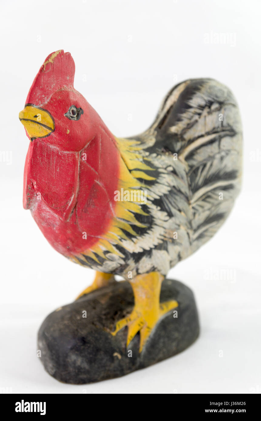 Folk Art carved chicken Stock Photo - Alamy