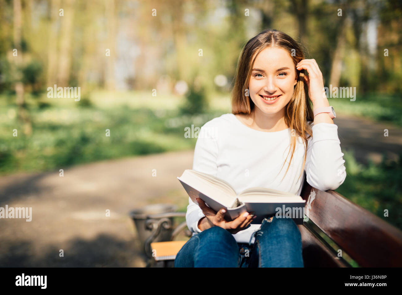 A shot of a college student reading a book Stock Photo - Alamy