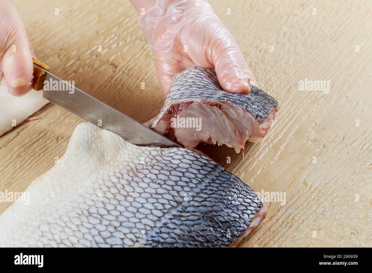 Old womens hands knife cut hi-res stock photography and images - Alamy