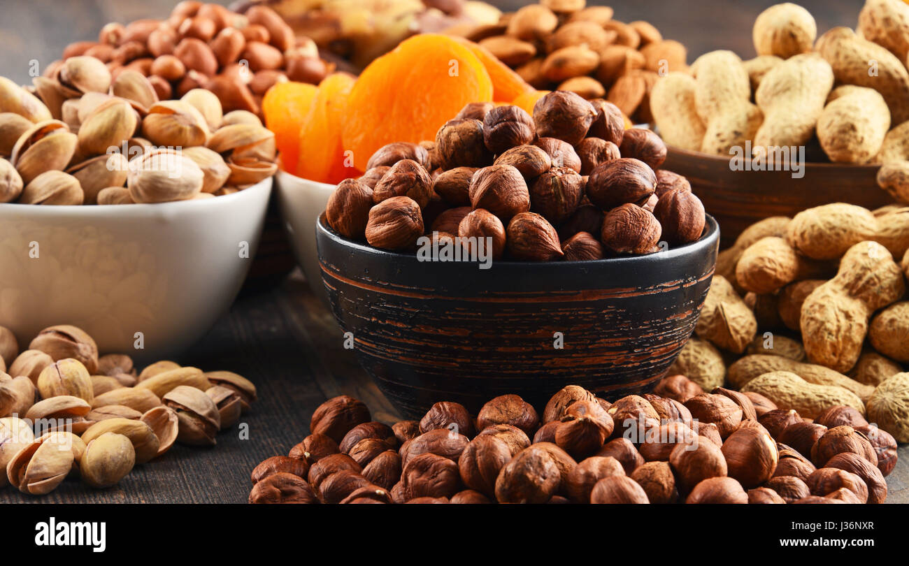 Composition with dried fruits and assorted nuts. Delicacies Stock Photo ...