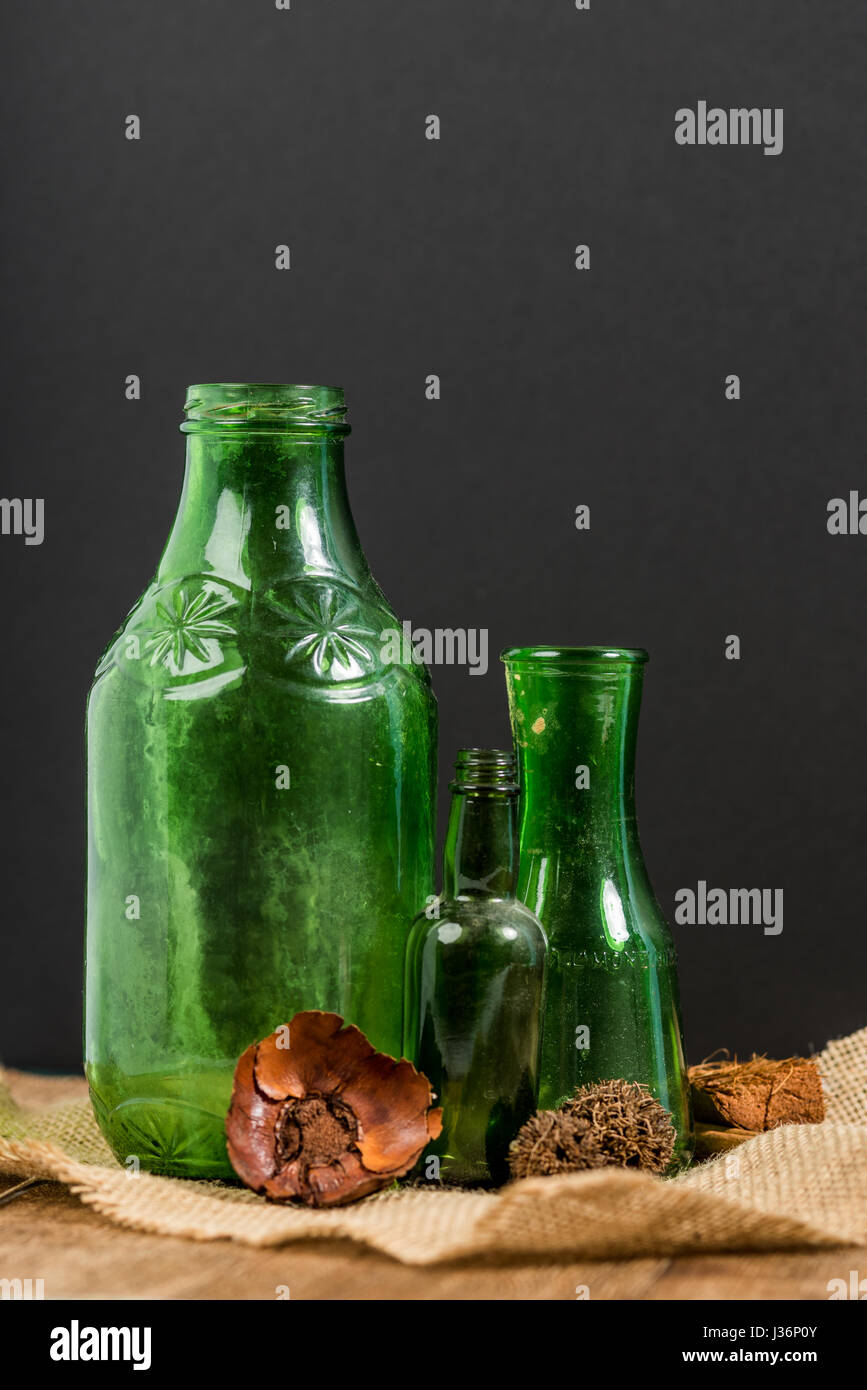 Vintage bottles in rustic setting Stock Photo - Alamy