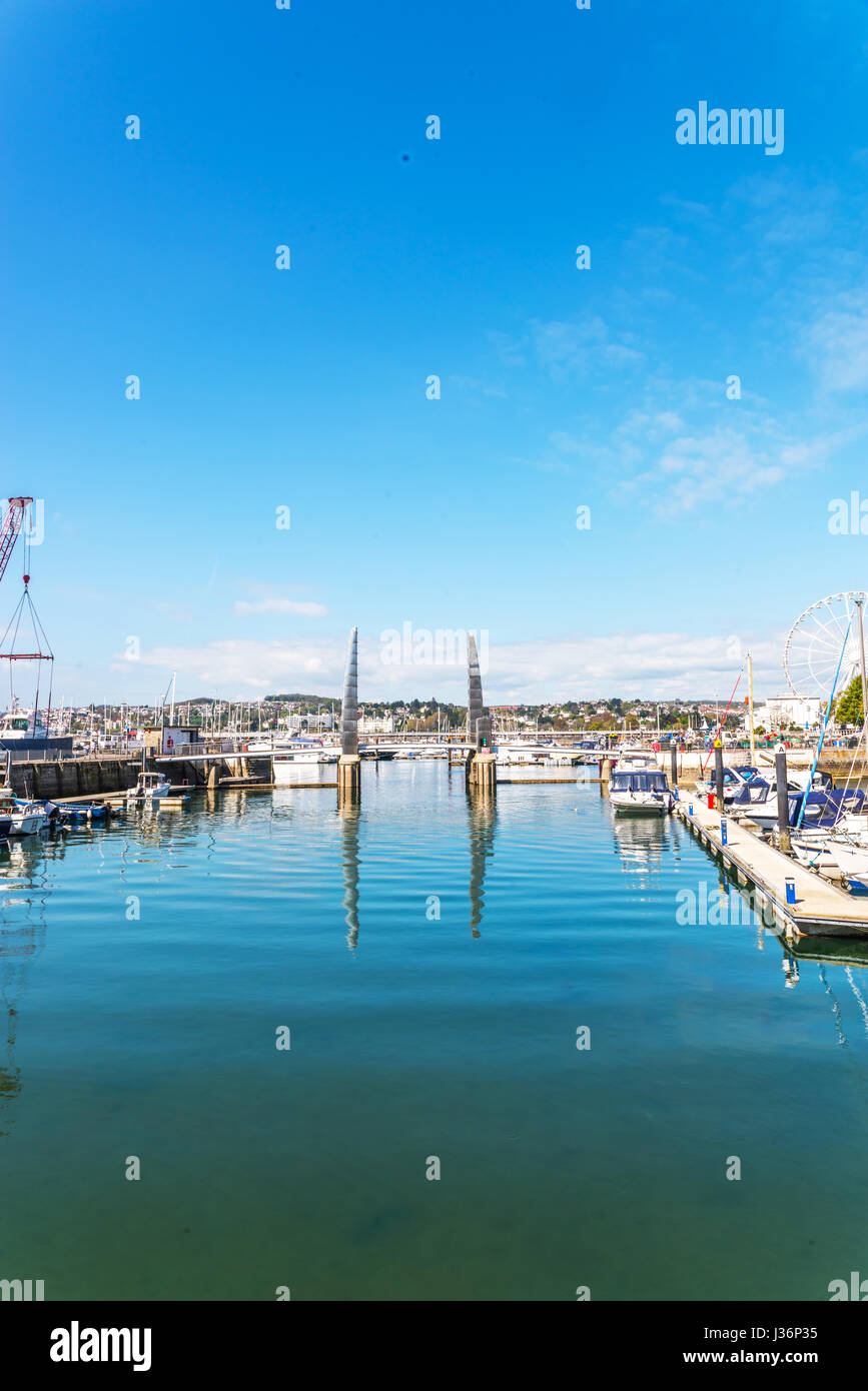 the gateway to the sailing marina with anchored boats and yachtami ...