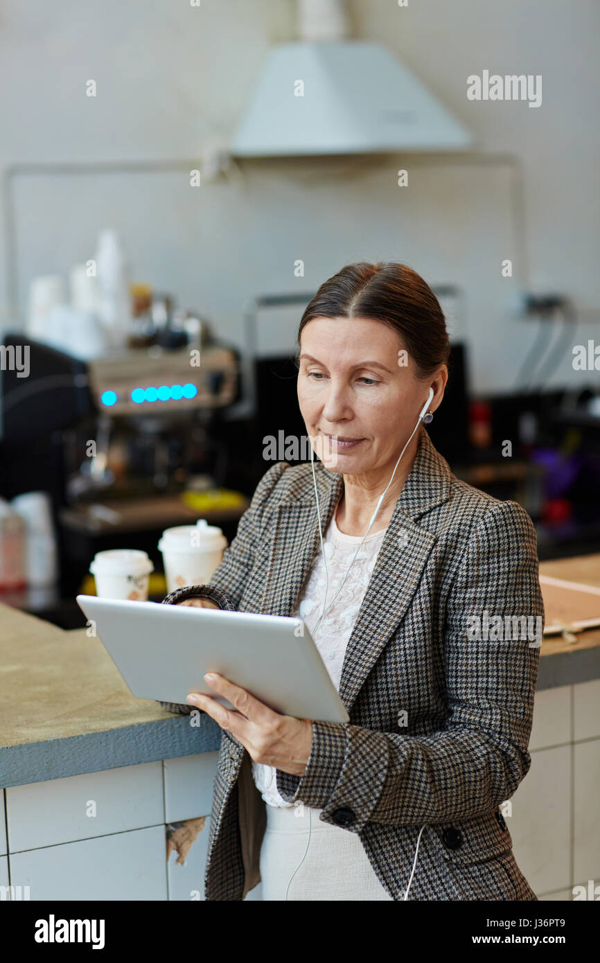 Senior Woman Using Digital Tablet Stock Photo - Alamy