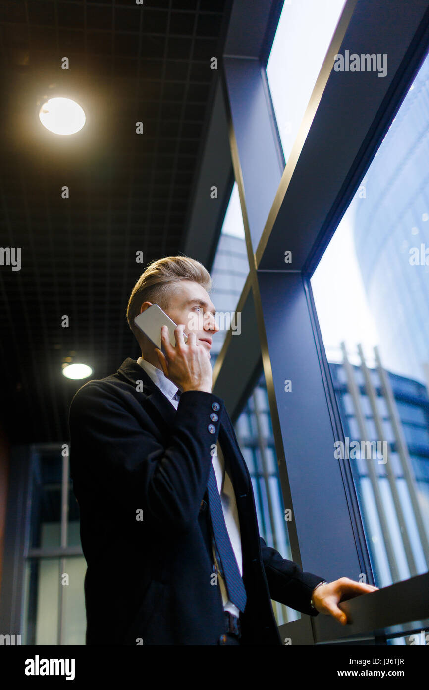 Talking to Client on Smartphone Stock Photo - Alamy