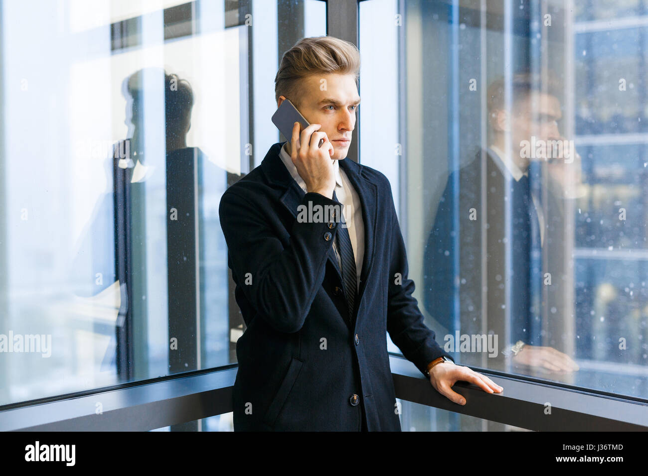 Office Worker Answering Phone Call Stock Photo - Alamy
