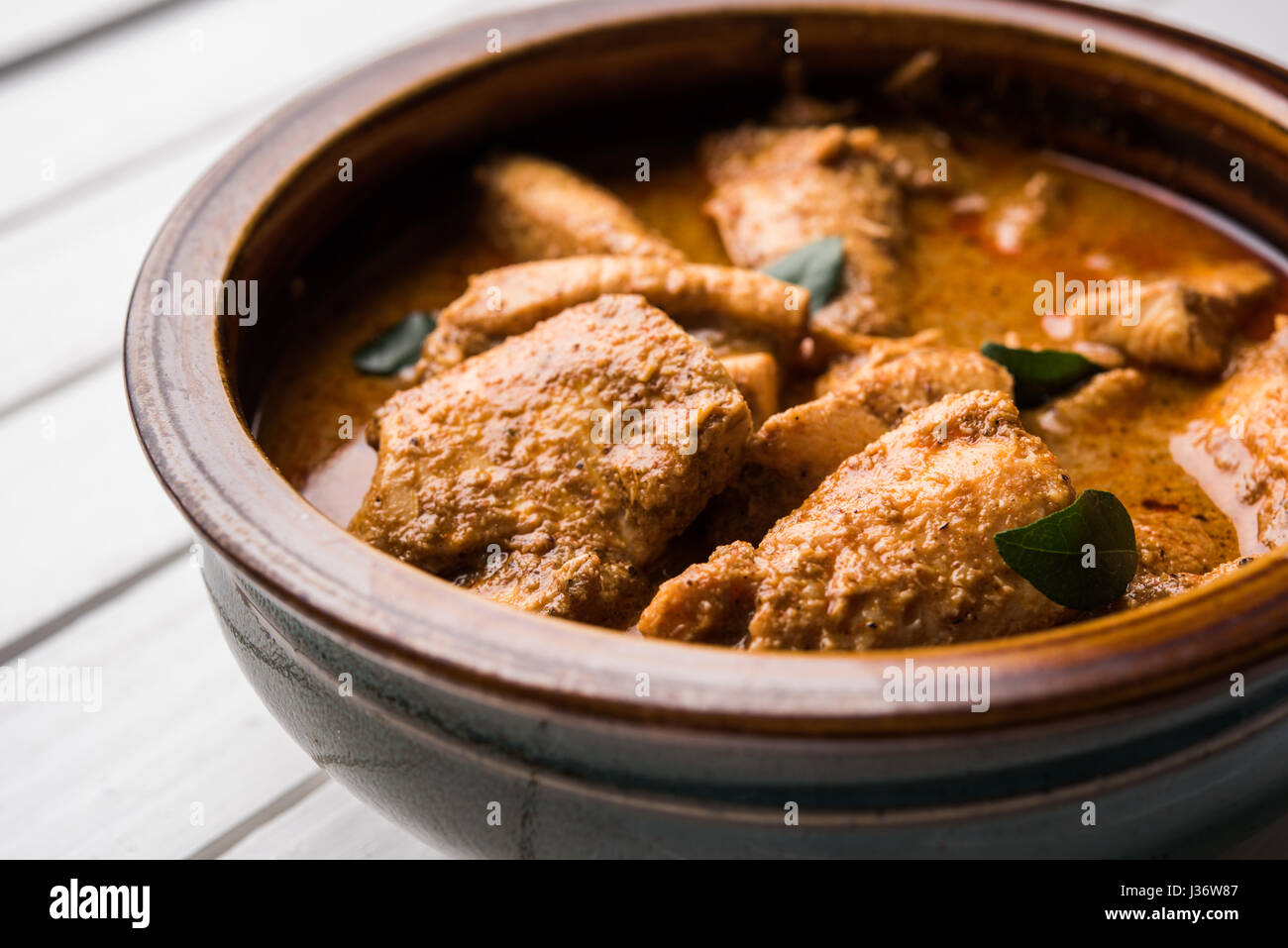 tasty fish curry served with white cooked basmati rice with curry ...