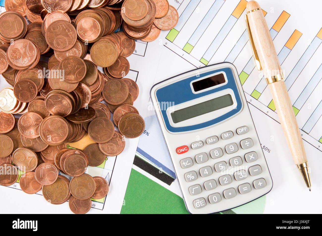 Financial analyzing concept, calculator,pen and Euro cents on paperwork ...