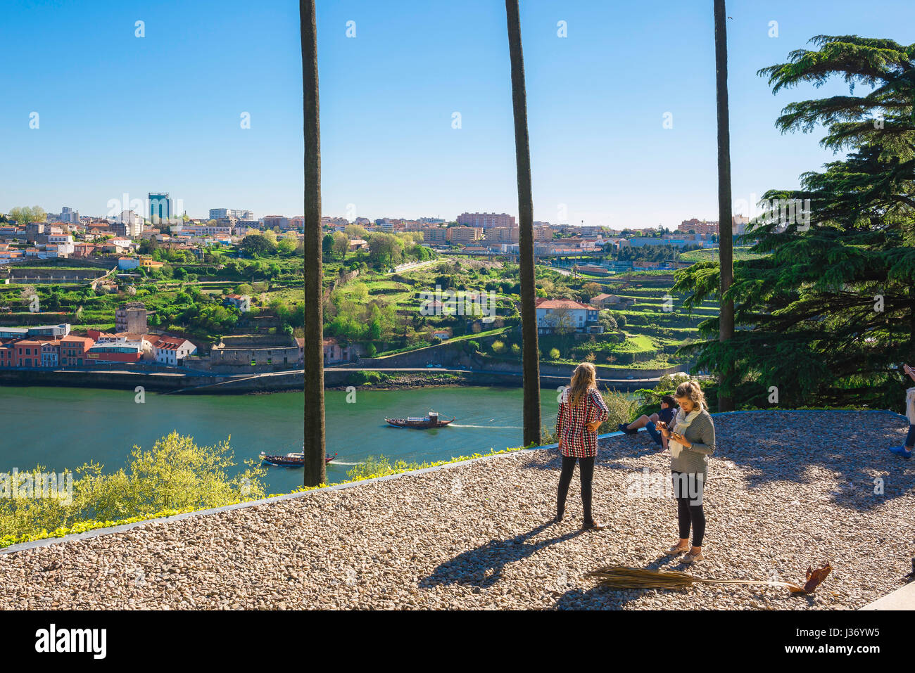 Porto park, view of tourists enjoying the panoramic view of the Douro ...