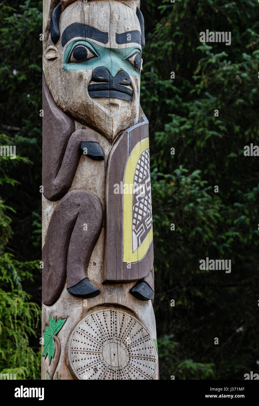 Totem poles in Alaska Stock Photo - Alamy