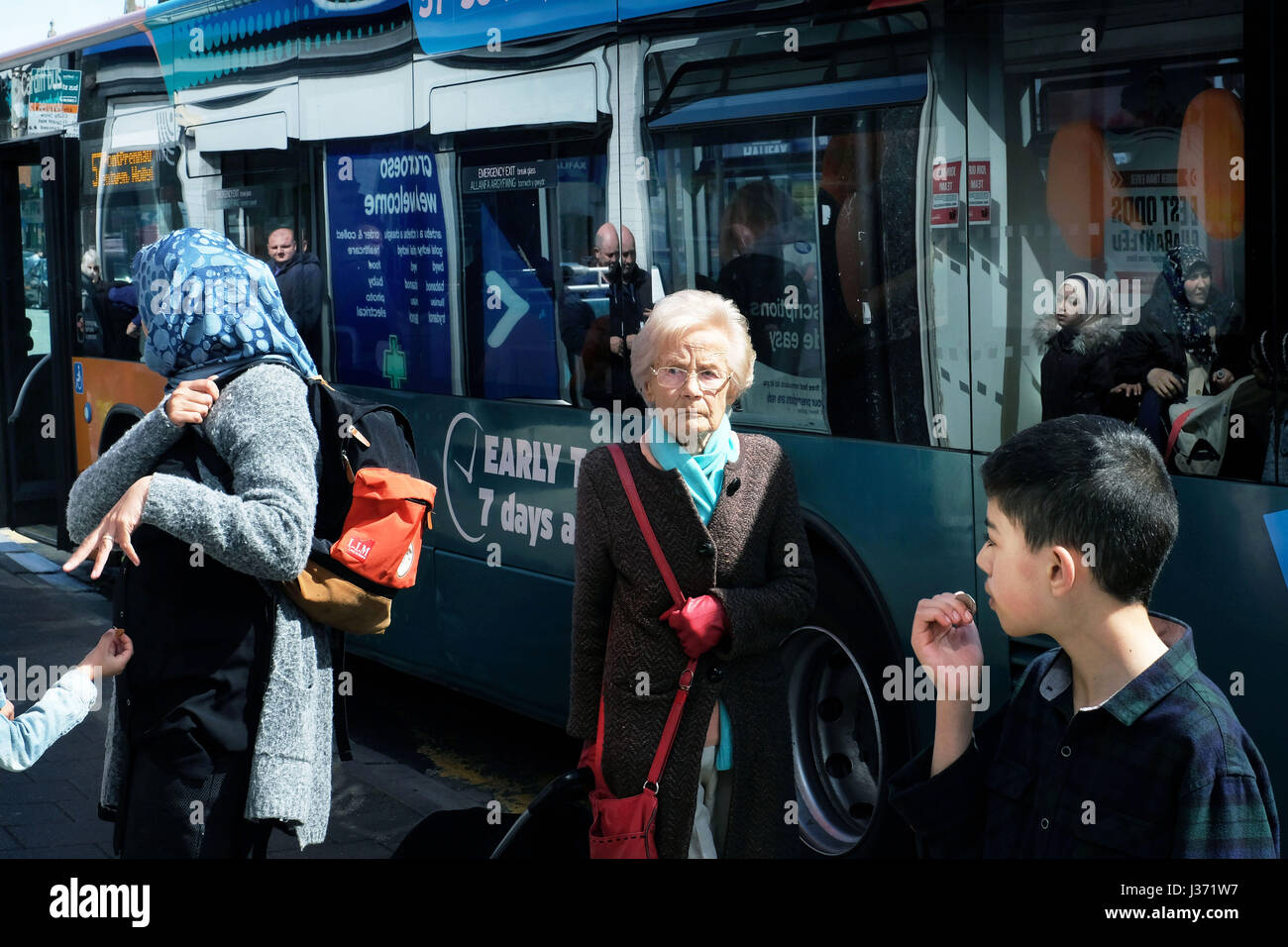 A busy bus stop in Cardiff, Wales, UK Stock Photo - Alamy