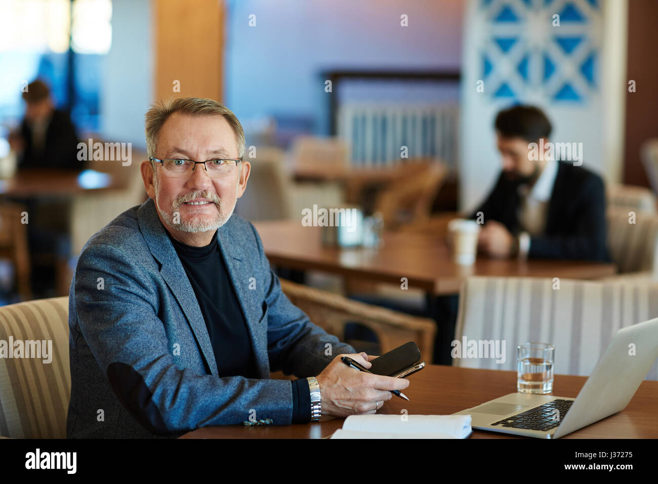 Entrepreneur Posing for Photography Stock Photo - Alamy