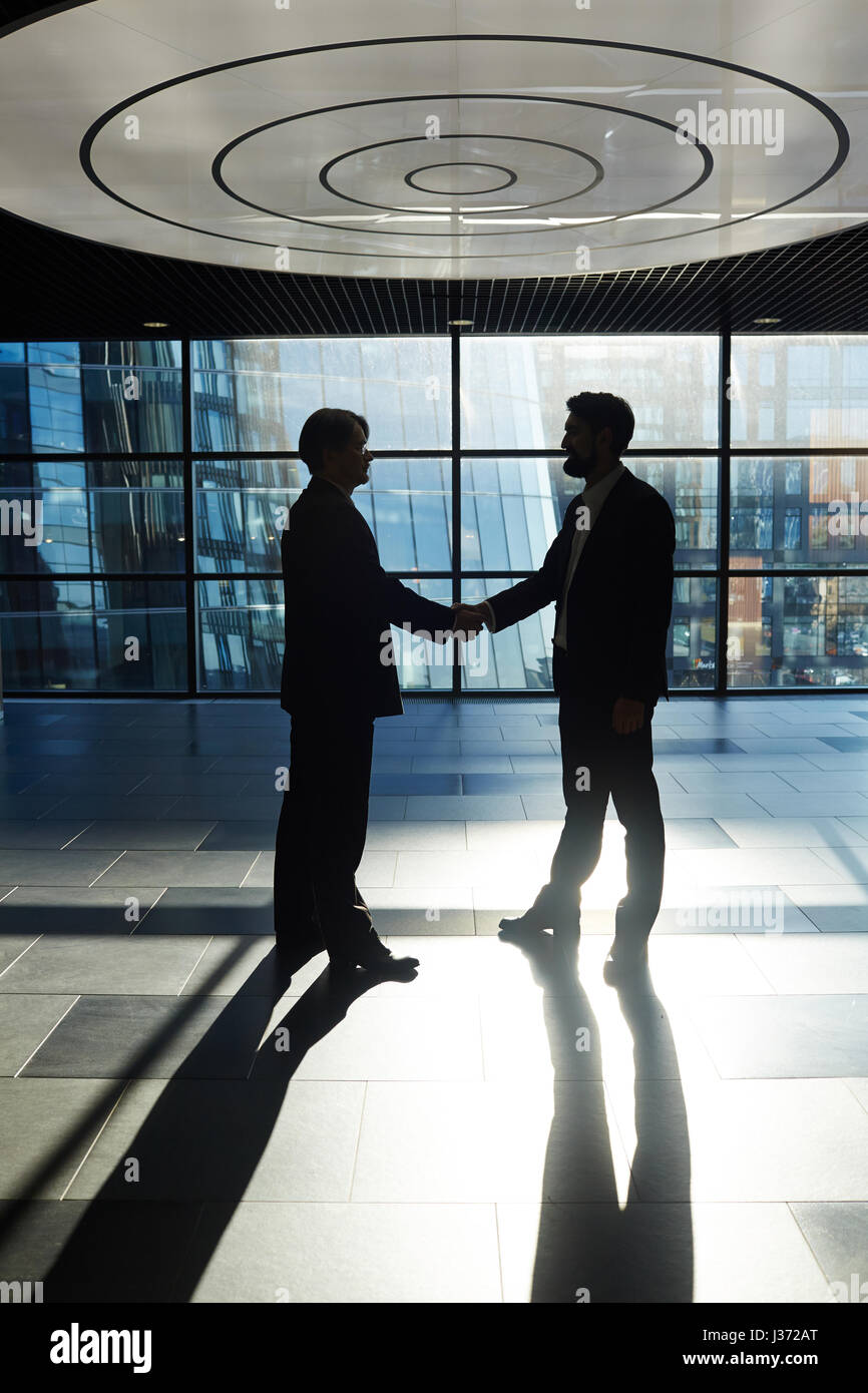 Firm Handshake of Businessmen Stock Photo - Alamy