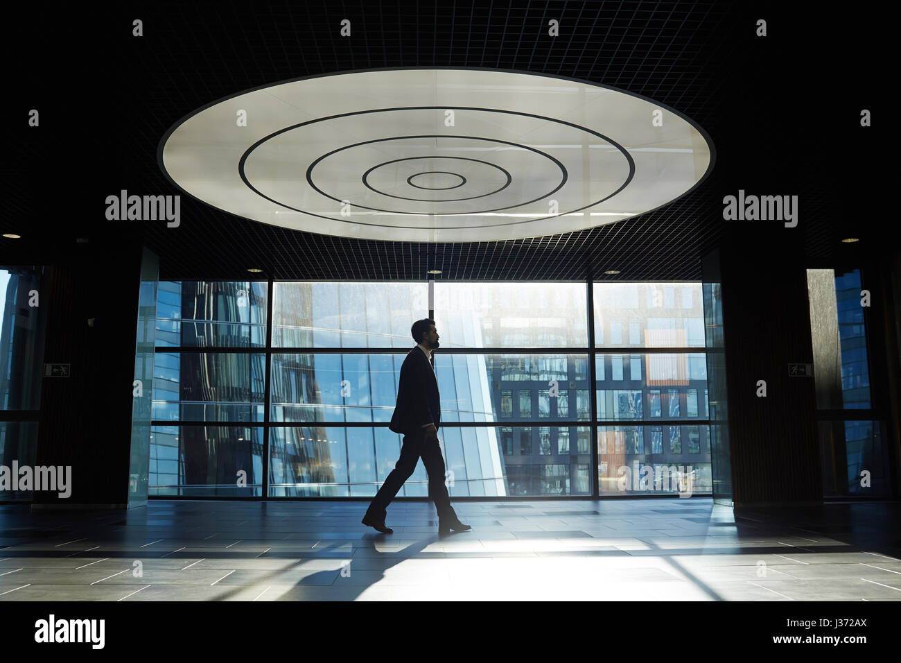 Walking Along Office Corridor Stock Photo - Alamy