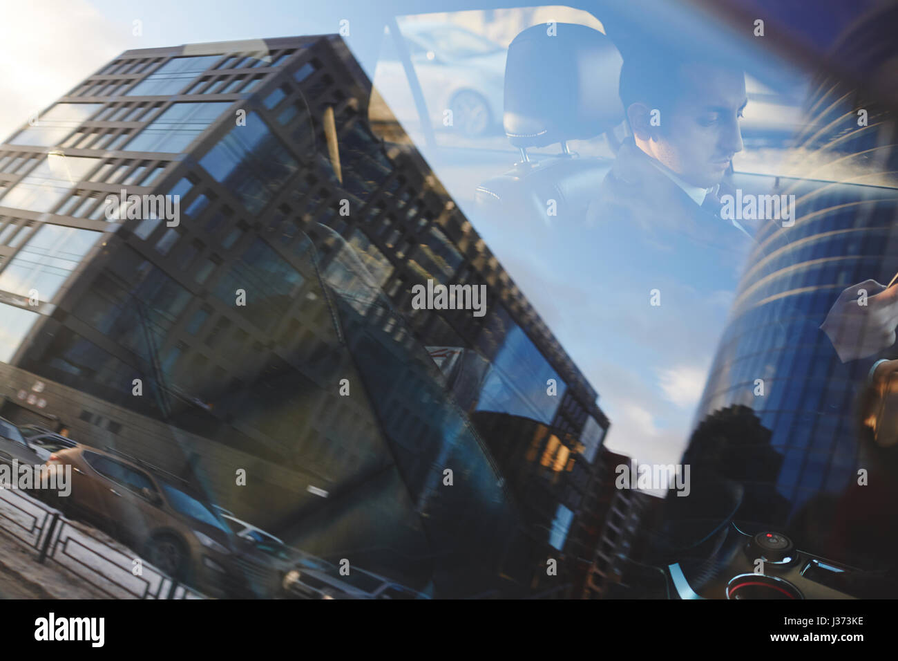 City Reflection in Car Window Stock Photo - Alamy