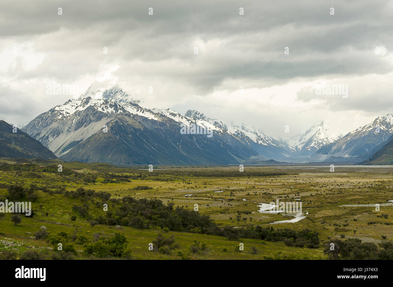 Mount Cook green valley in a cloudy, rainy day Stock Photo - Alamy