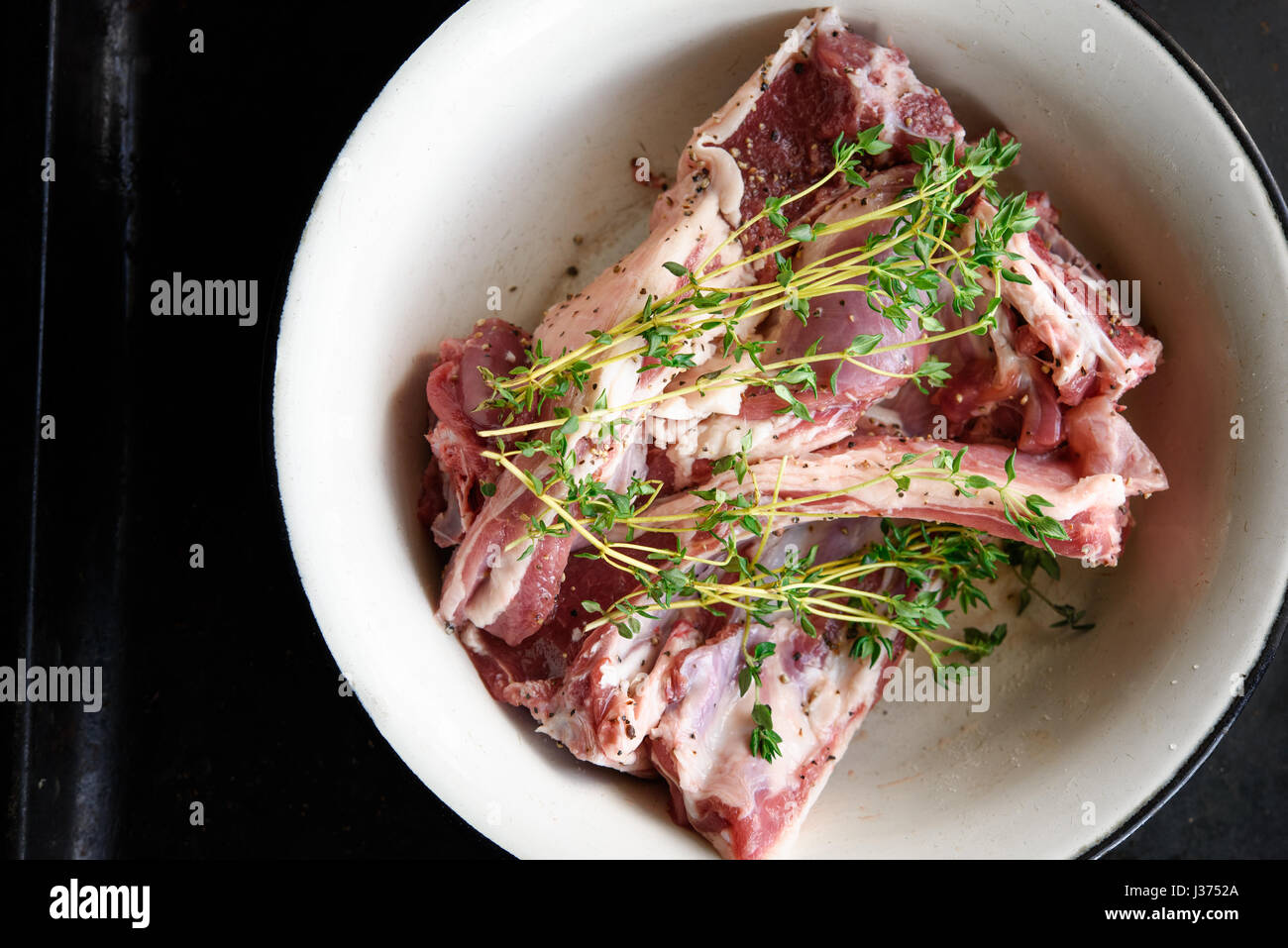 Top view of lamb loin and thyme Stock Photo - Alamy
