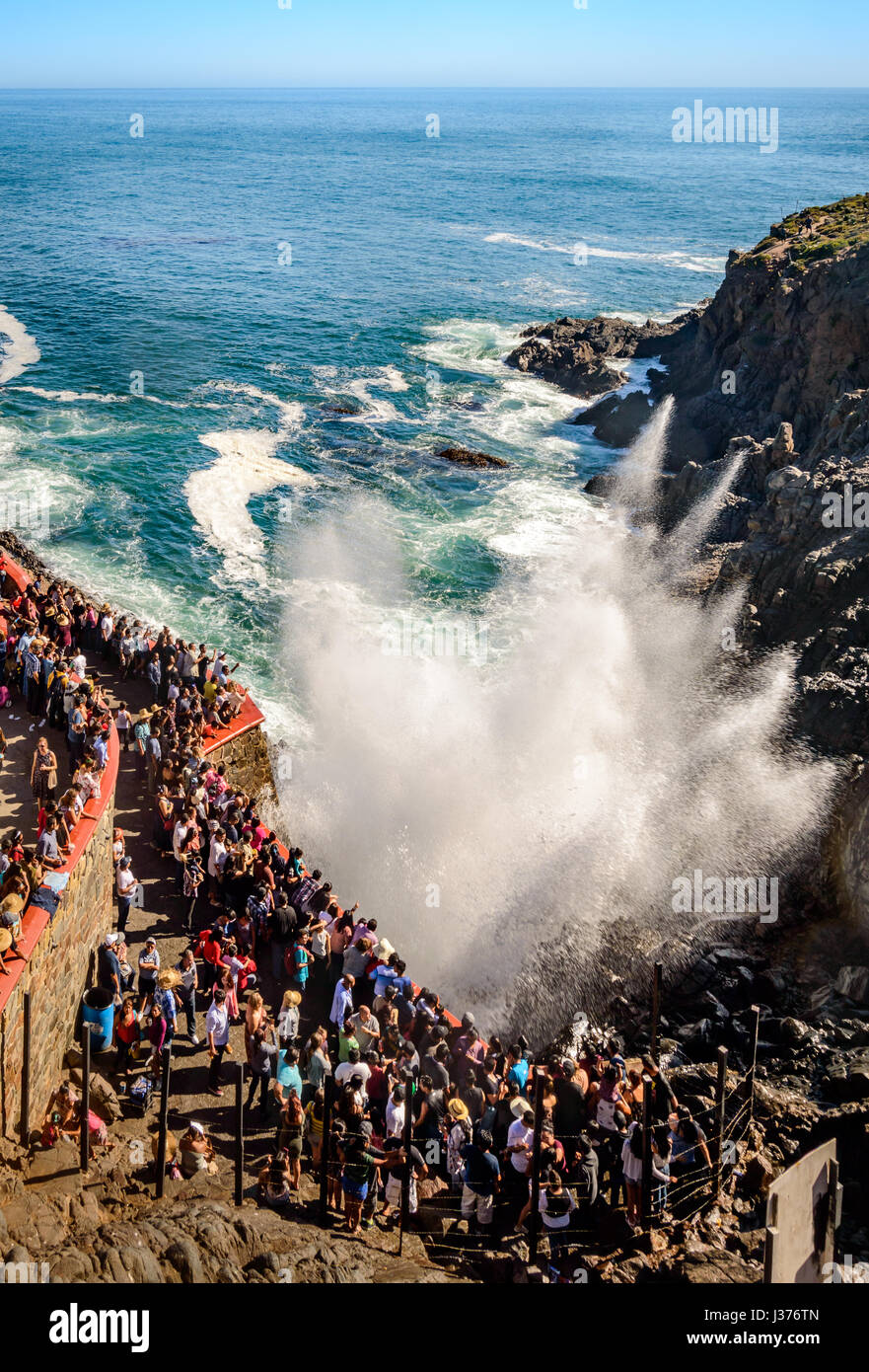 La Bufadora sprays the crowed assembled to see it on a hot summer day ...