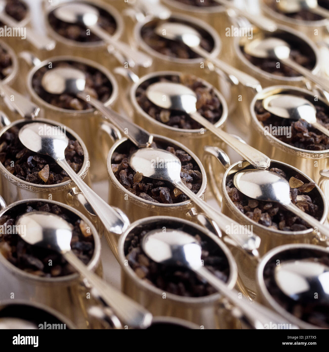 Rows of containers filled with raisins Stock Photo - Alamy