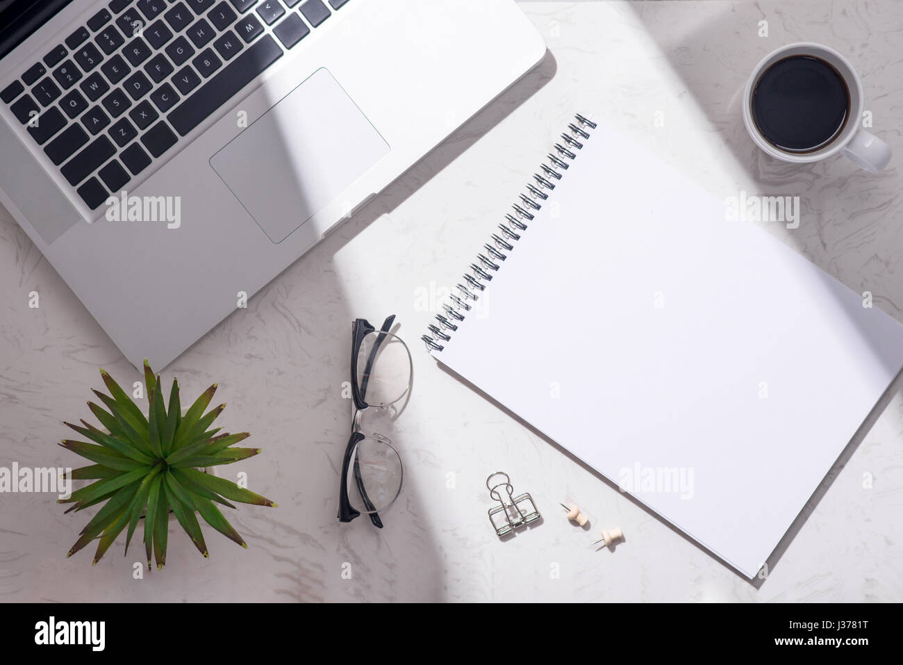 Flat lay, top view of open notebook and other supplies Stock Photo - Alamy